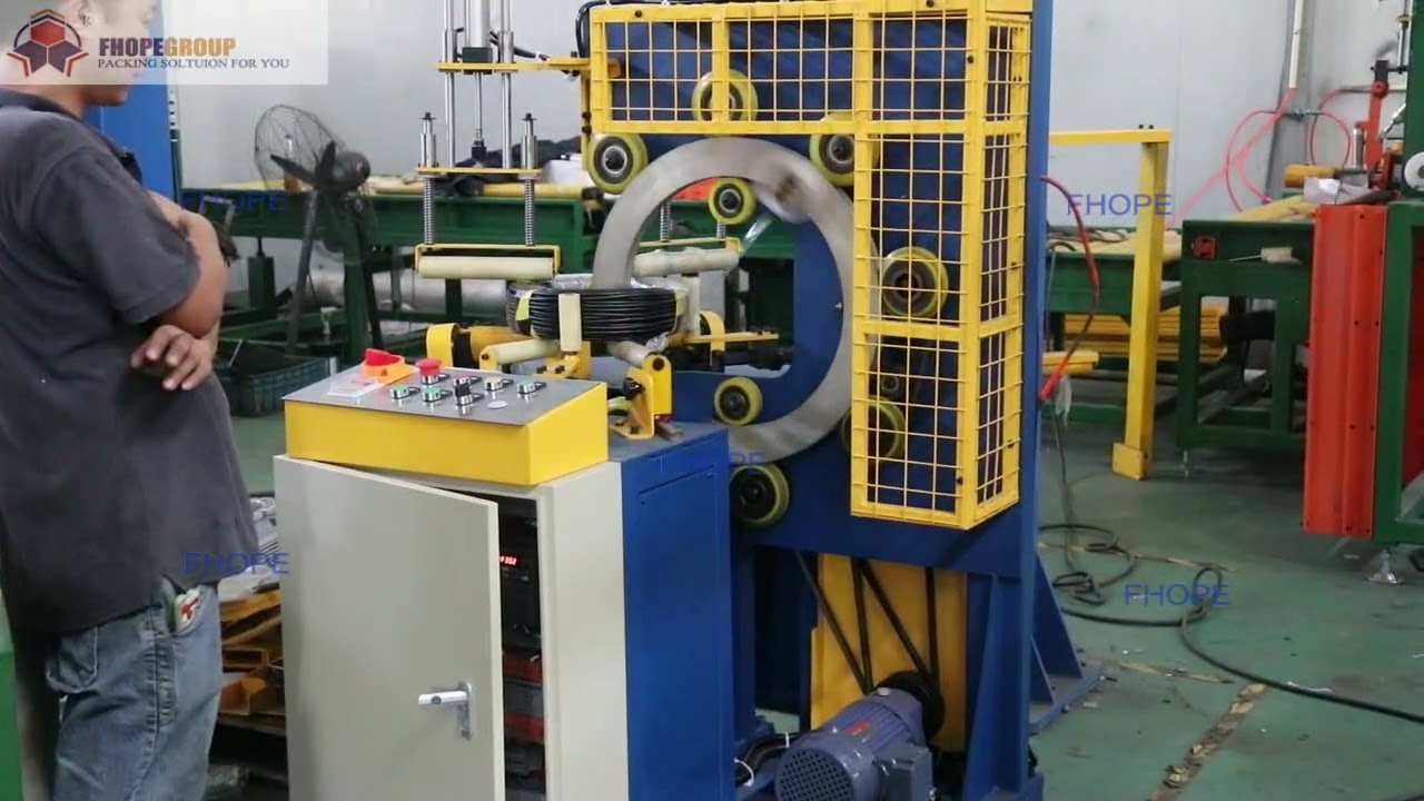 Compact film wrapping machine for cable coils. - CUSTOMIZED WRAPPING ...
