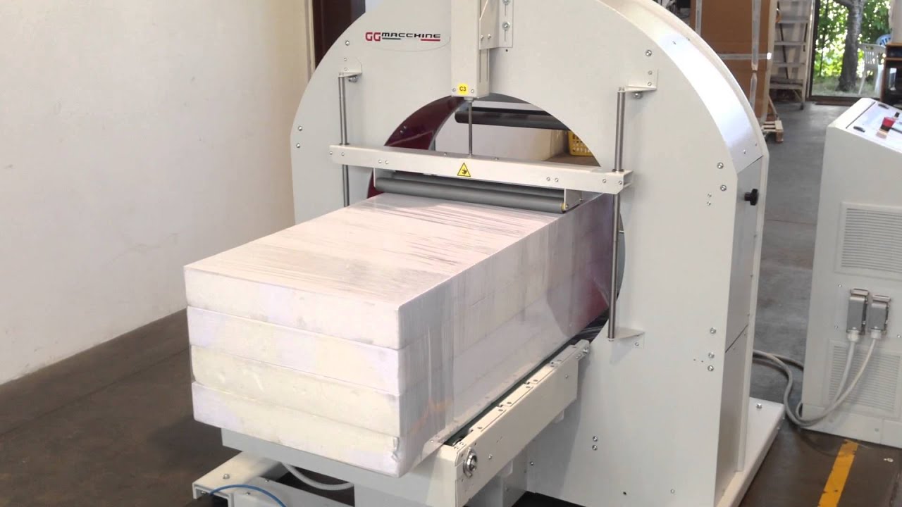 Compact horizontal stretch wrapping machine for efficient packaging ...