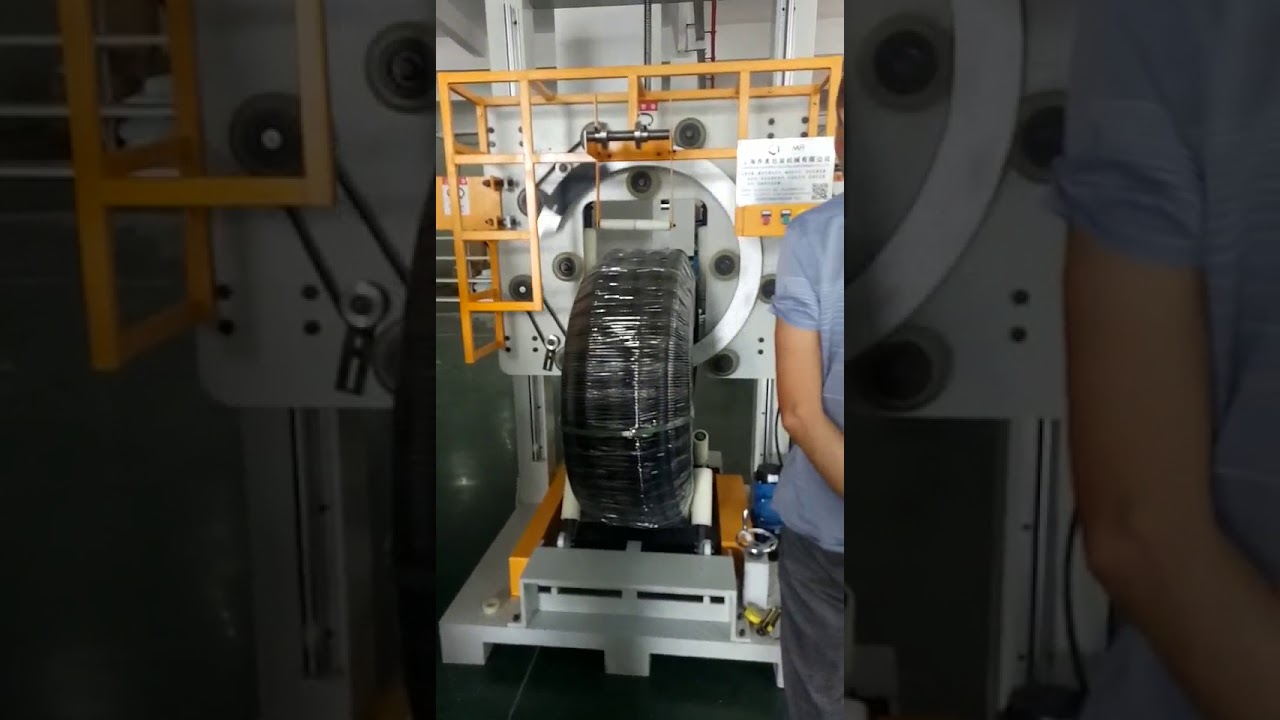 Coil Wrapping Machine for Large Hose - CUSTOMIZED WRAPPING SOLUTIONS